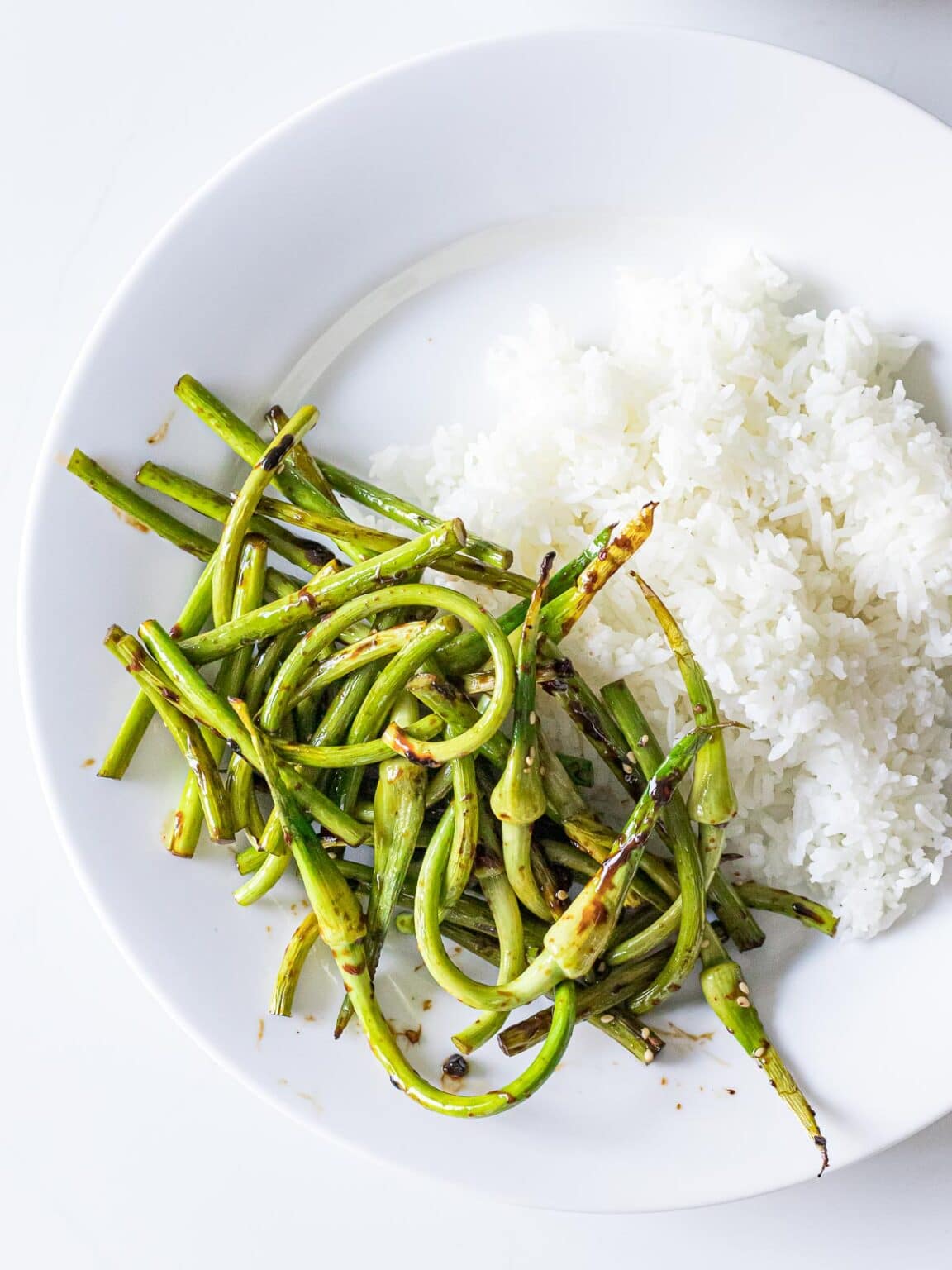 Stir Fried Garlic Scapes - Drive Me Hungry