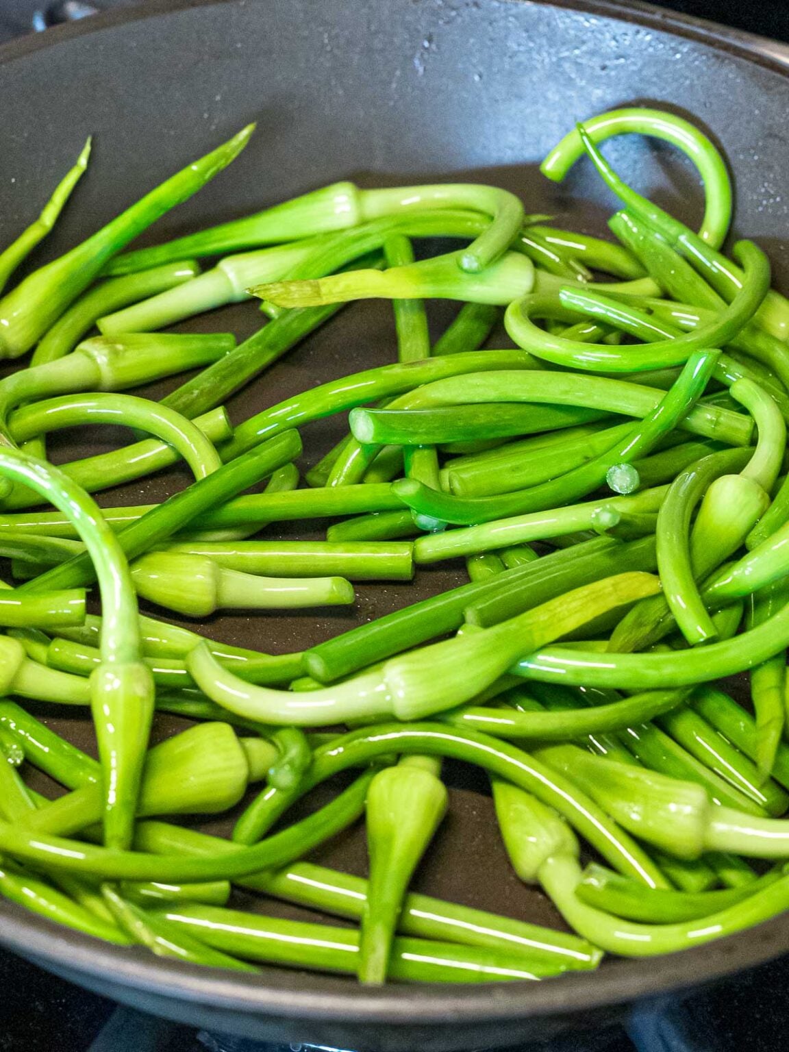 Stir Fried Garlic Scapes - Drive Me Hungry