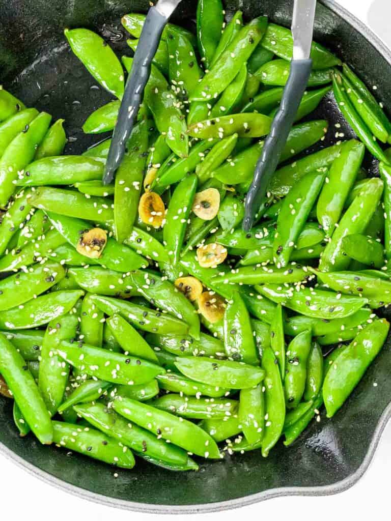 Stir Fried Sugar Snap Peas with Garlic and Sesame - Drive Me Hungry