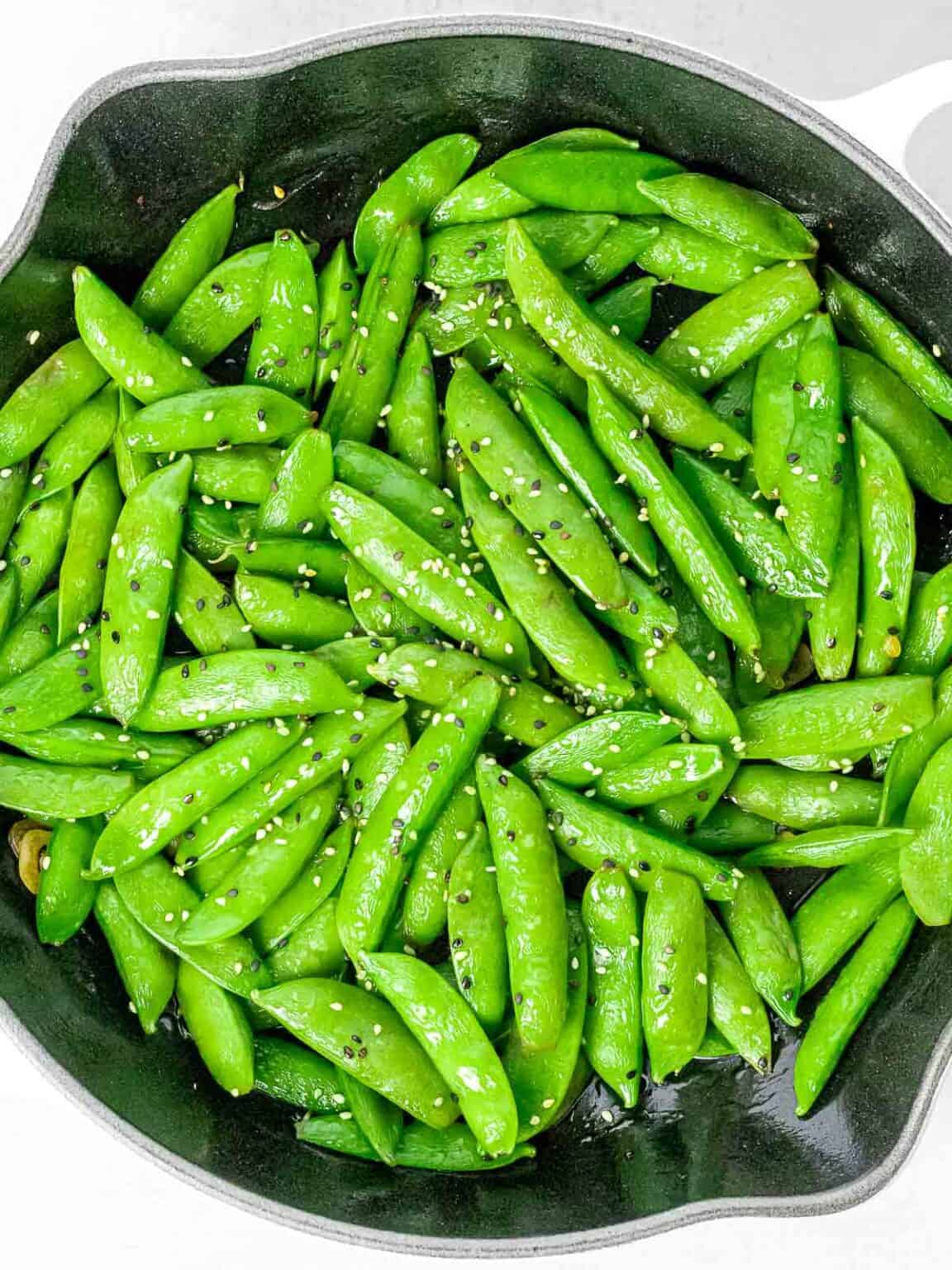 Stir Fried Sugar Snap Peas with Garlic and Sesame - Drive Me Hungry