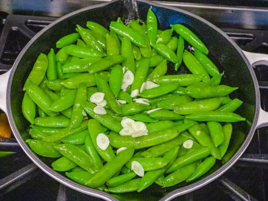 Stir Fried Sugar Snap Peas with Garlic and Sesame - Drive Me Hungry